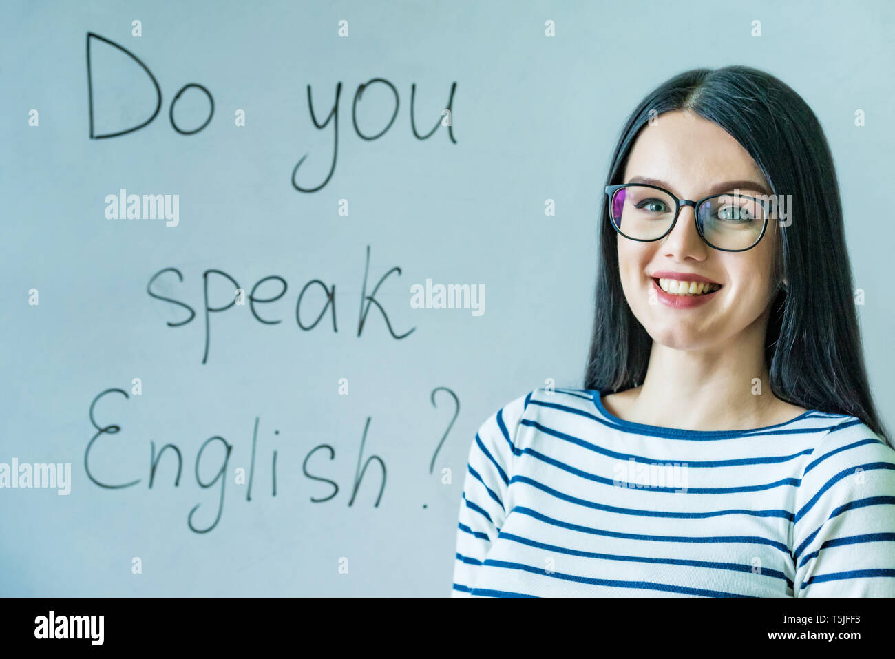 Beautiful girl with glasses and words do you speak English Stock Photo ...