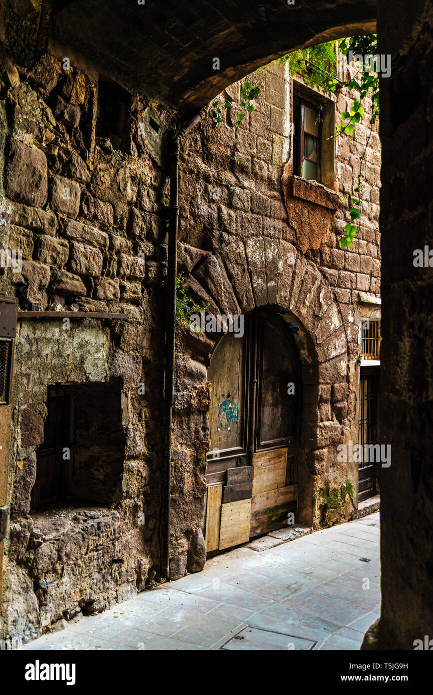 Old stone passage in the old town of the medieval city of Cardona in ...