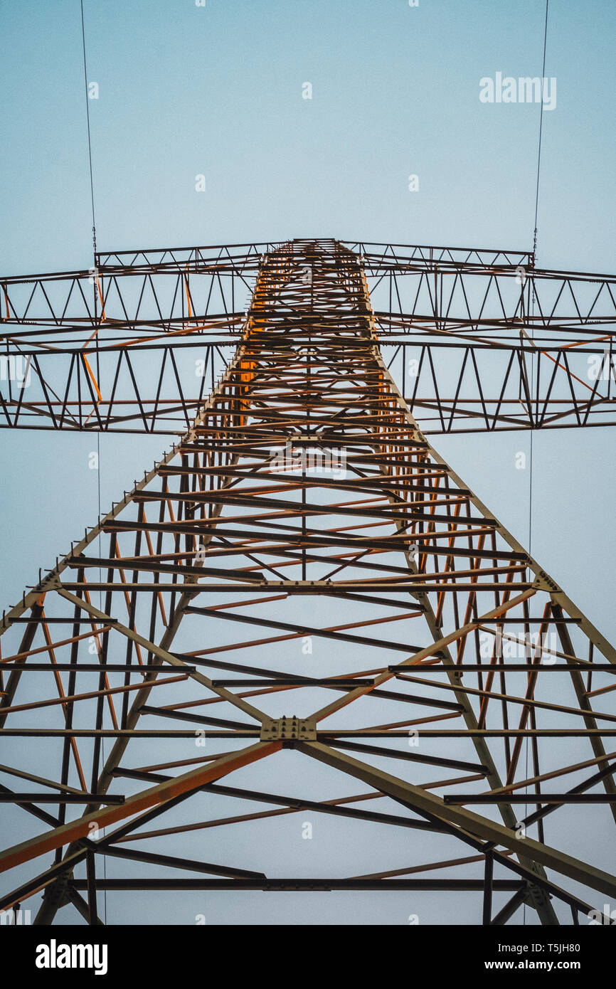Power pylon seen from below Stock Photo - Alamy