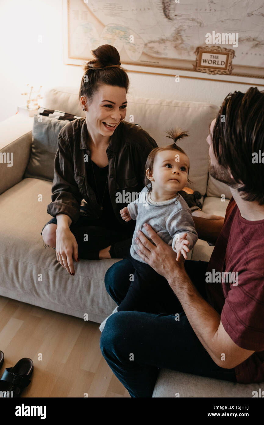 Baby in family living room hi-res stock photography and images - Alamy
