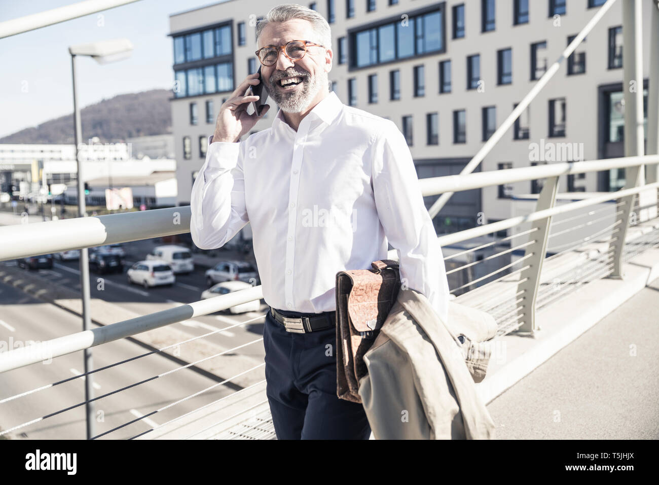 Mature happy businessman talking hi-res stock photography and images ...