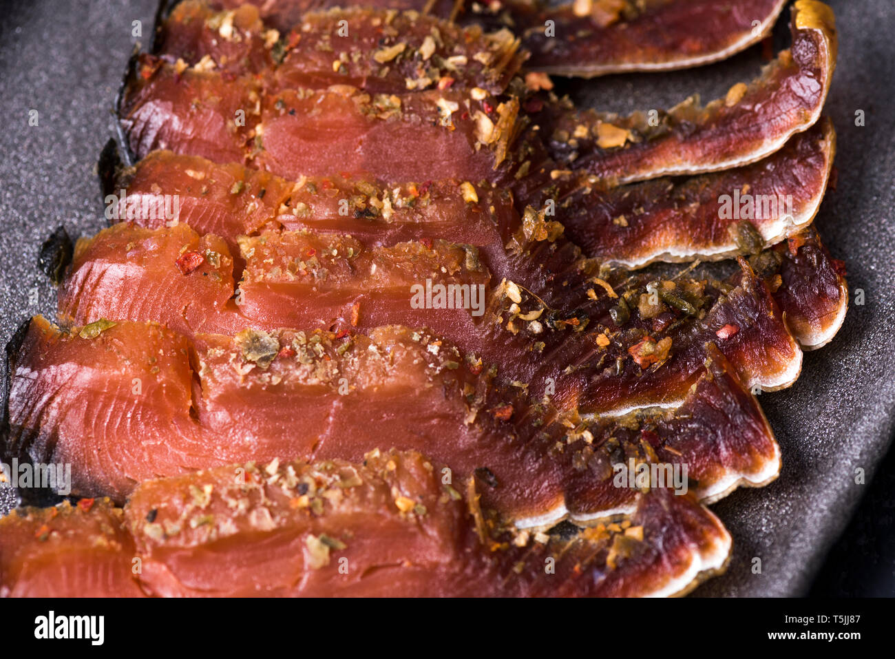 Pieces of dried fish with red meat of pink salmon Stock Photo - Alamy