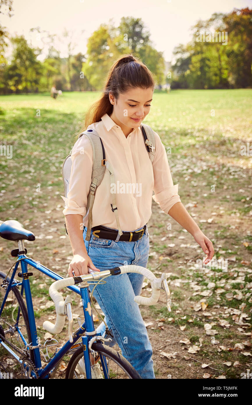 Young woman bike hi-res stock photography and images - Alamy
