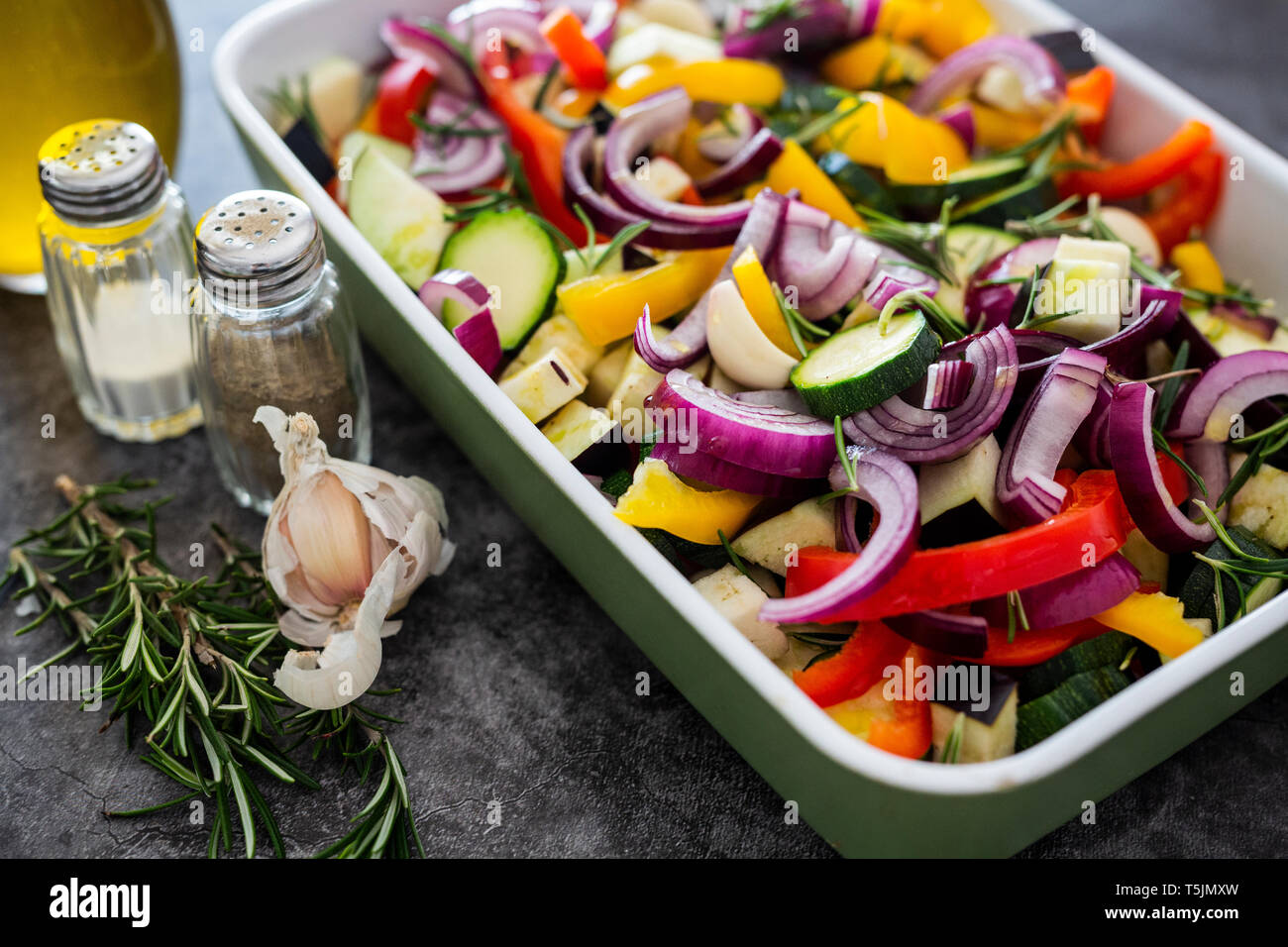 Mix of raw vegetables in casserole Stock Photo - Alamy