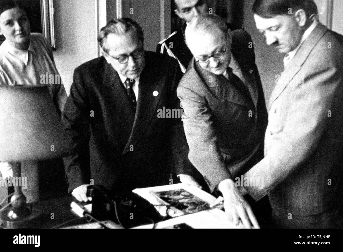Eva Braun Collection (album 5) - Adolf Hitler looking at a book (ca ...