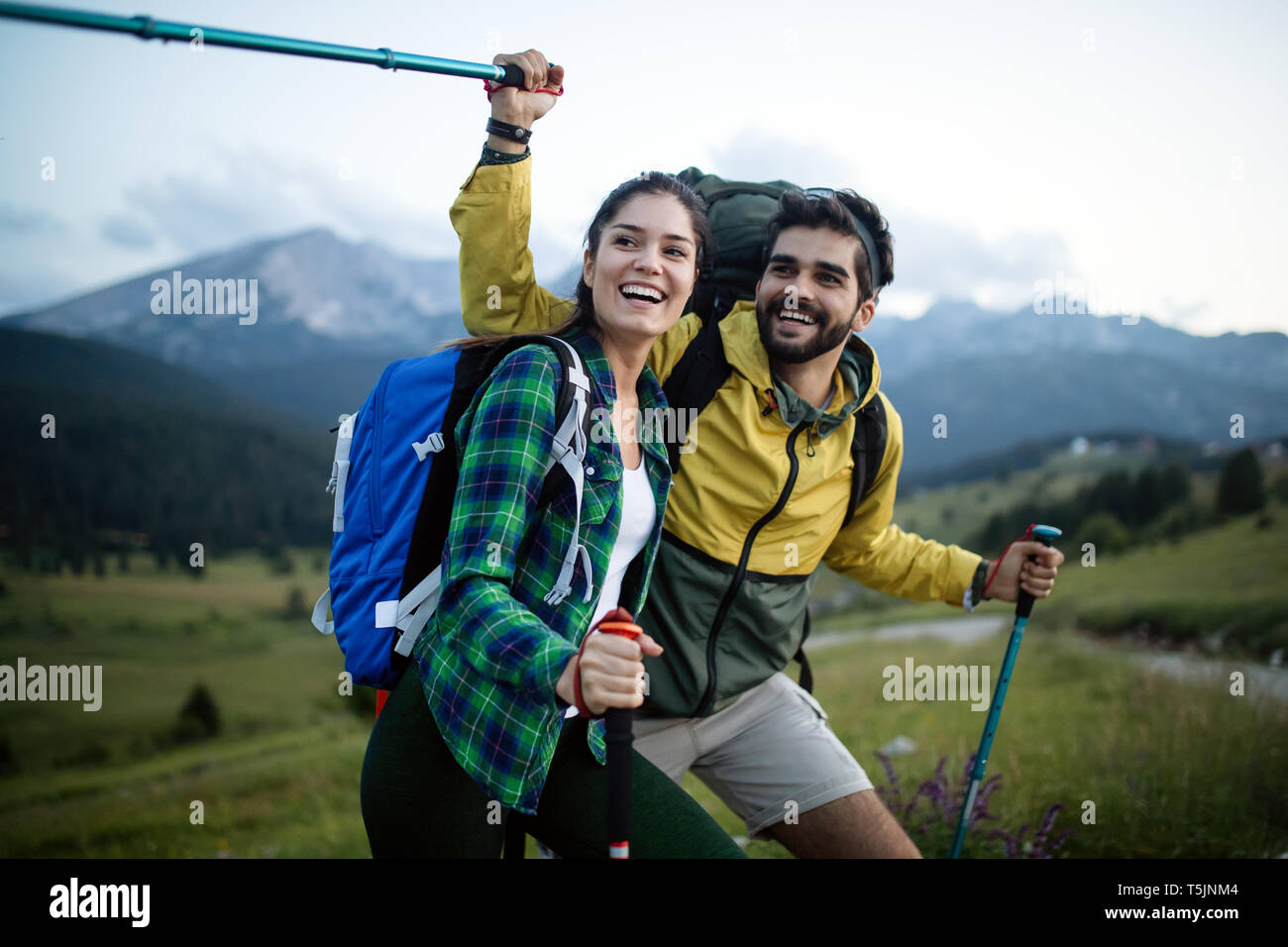 Young female backpackers happy hi-res stock photography and images - Alamy
