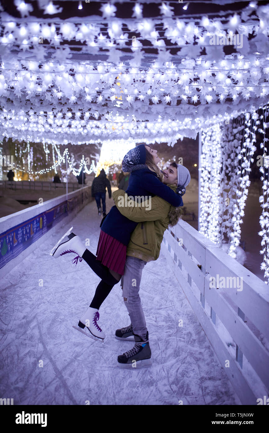 Couple happy night hugging hi-res stock photography and images - Alamy
