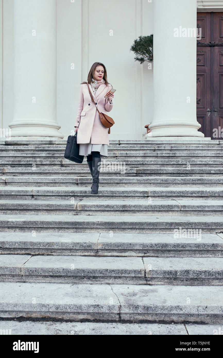 Walking downstairs hi-res stock photography and images - Alamy