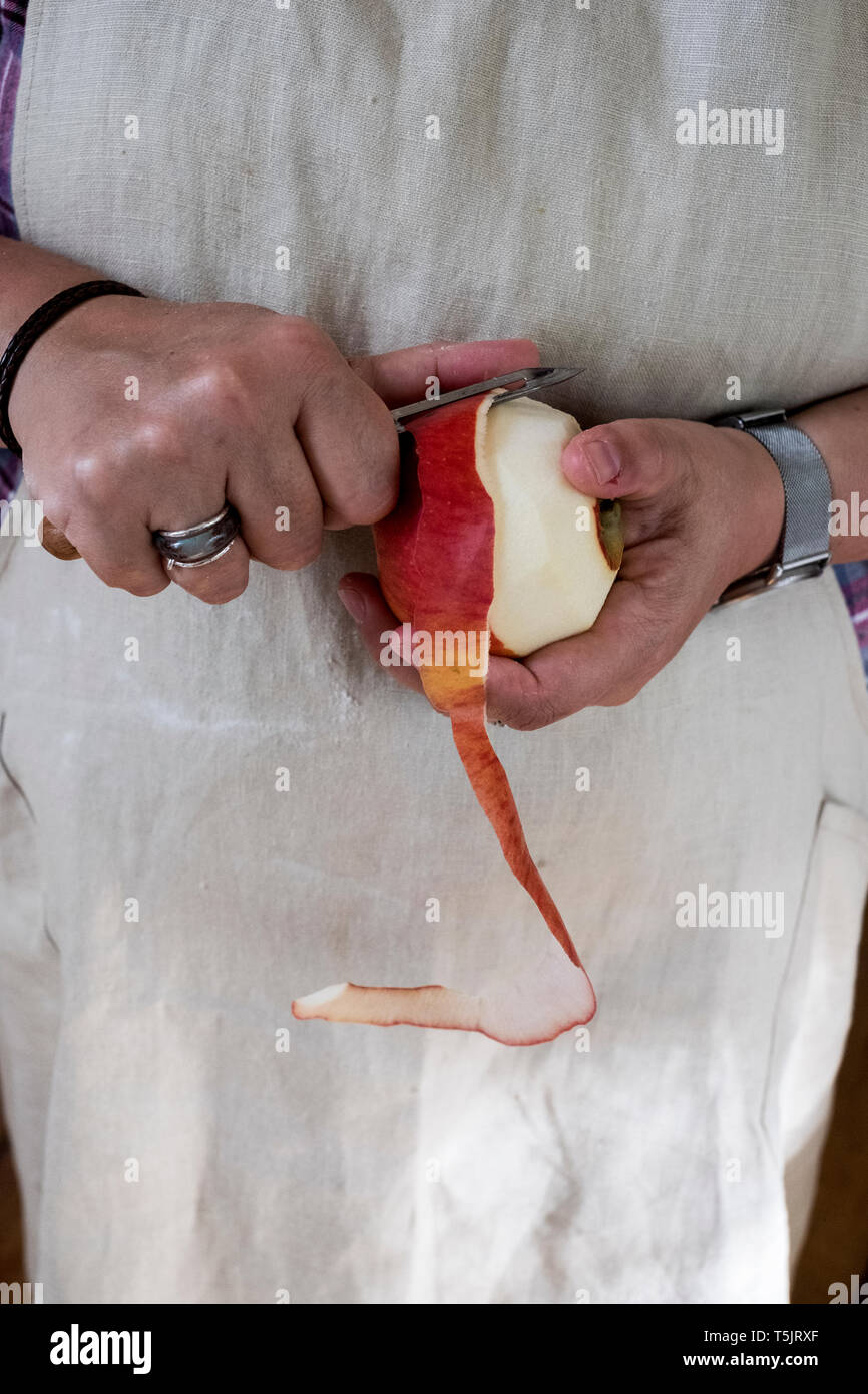 Peeling apple with knife hi-res stock photography and images - Alamy
