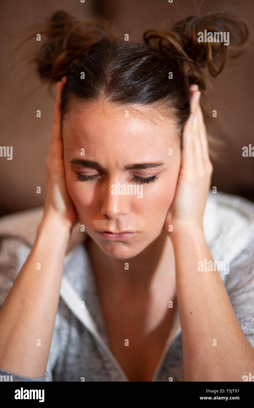 Hands over ears hi-res stock photography and images - Alamy