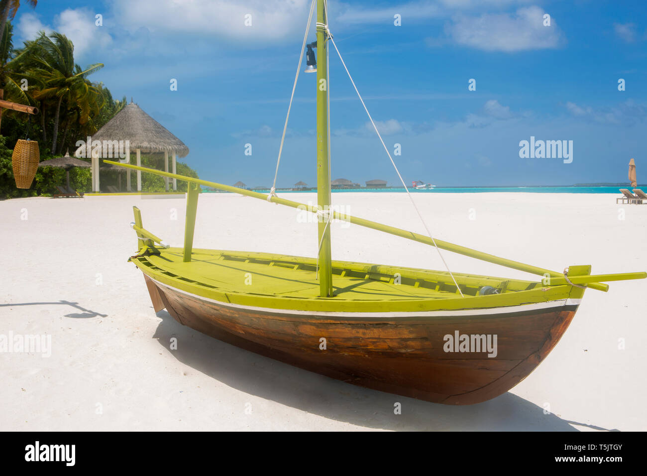 Maldives, boat on the beach Stock Photo - Alamy