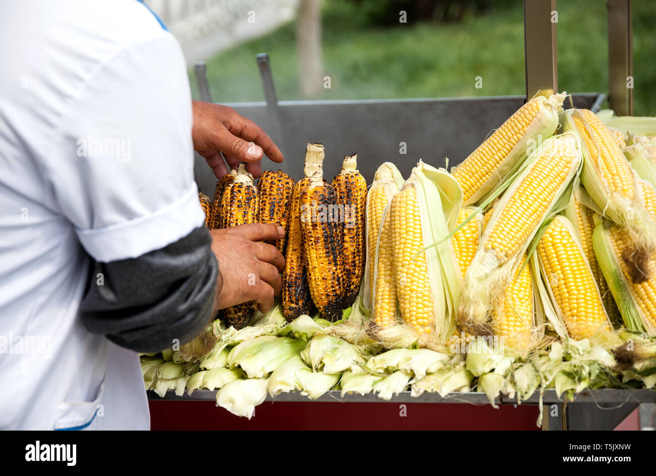 Fresh boiled and roasted corn is famous street food of Istanbul, Turkey ...