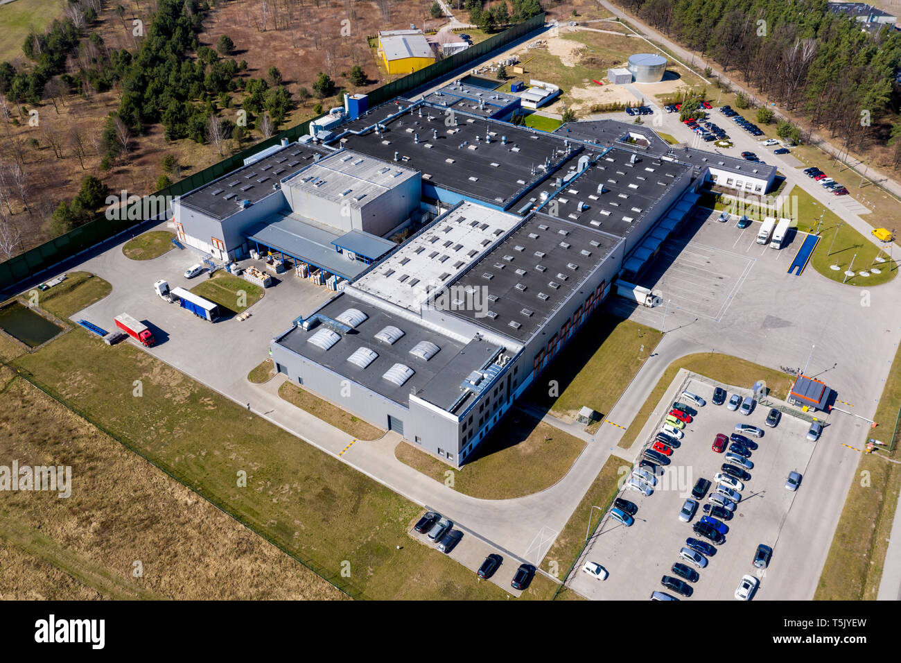 Distribution warehouse with trucks of different capacity. Aerial View ...