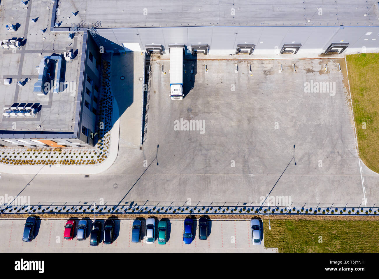 Loading bay, industrial building, logistics - aerial view Stock Photo ...