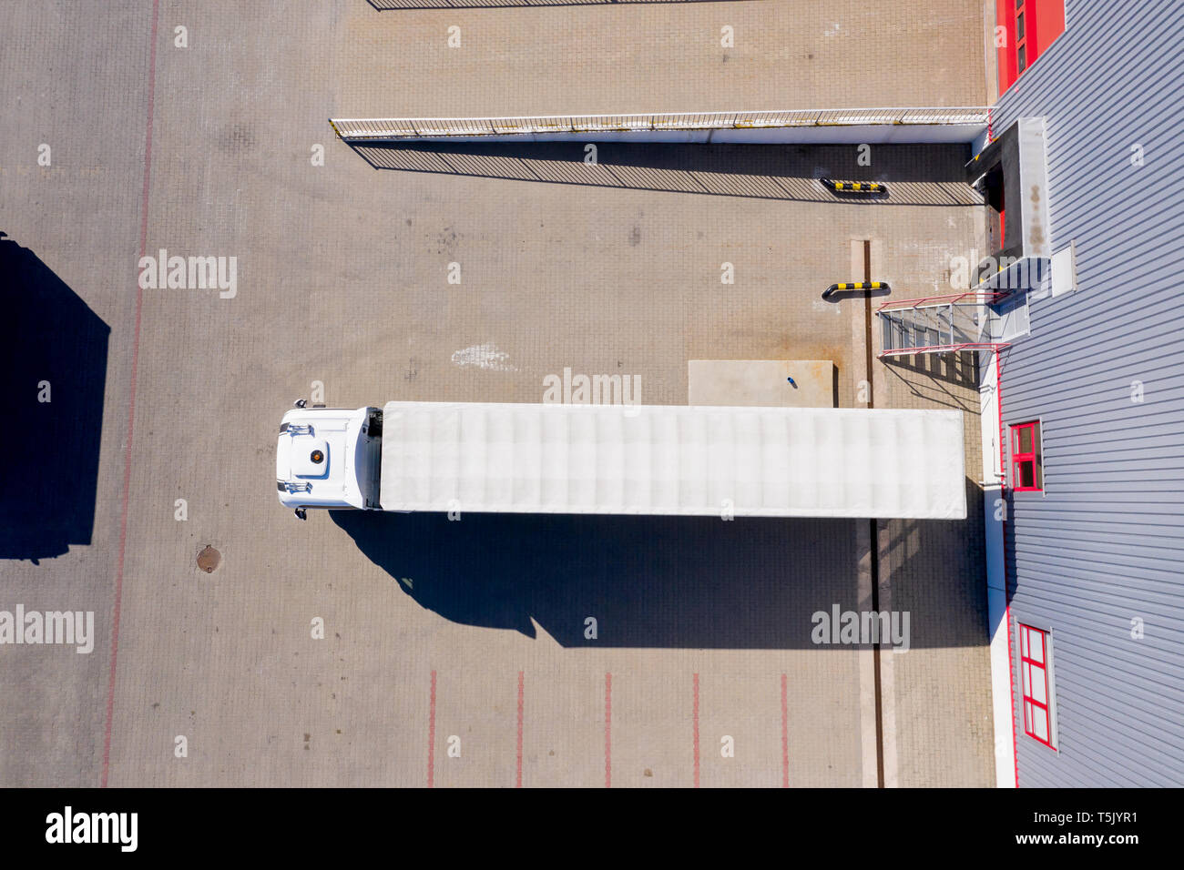 Large distribution hub, trucks and trailers. Aerial View Stock Photo ...