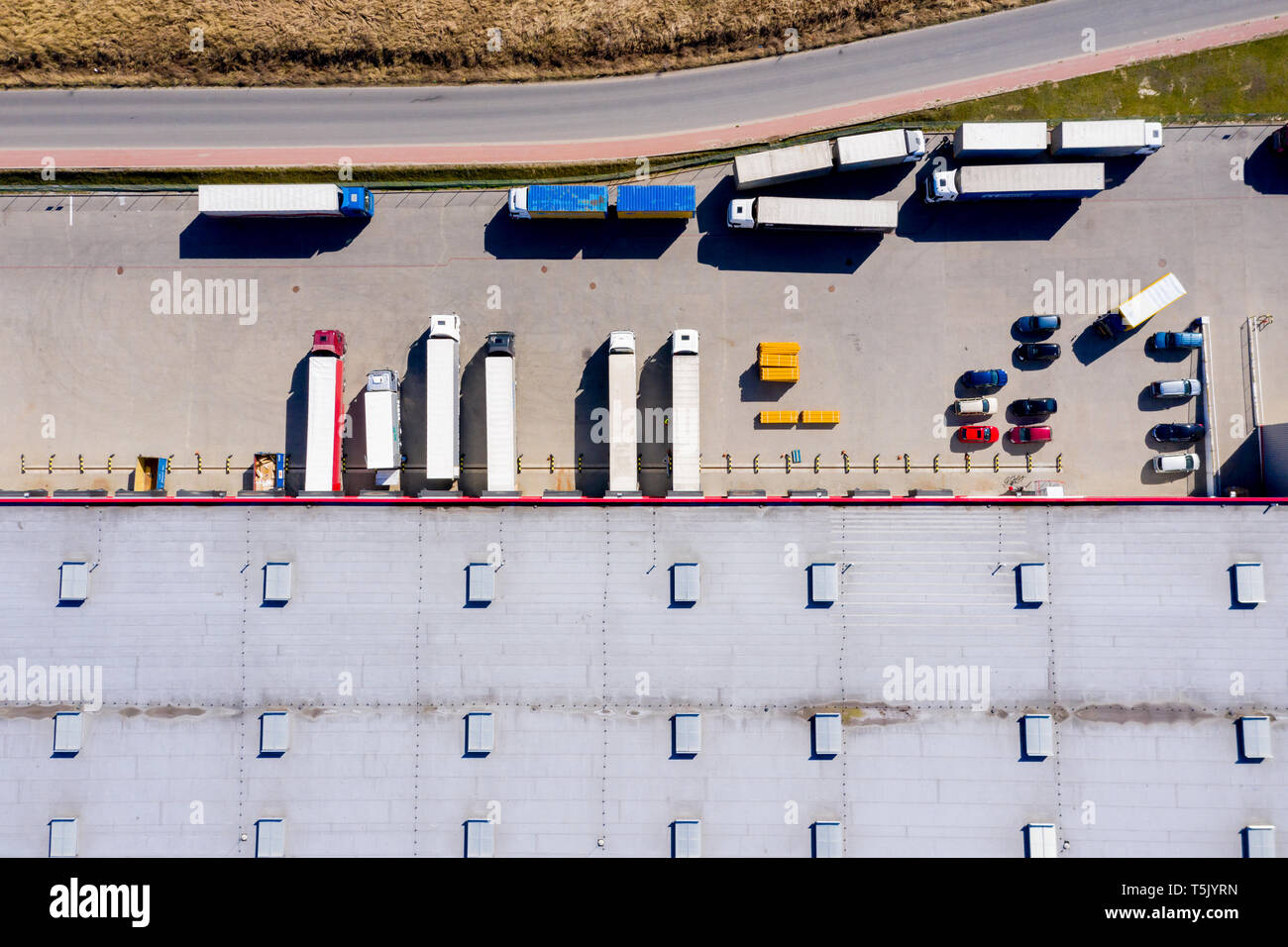 Aerial Shot of Truck with Attached Semi Trailer Leaving Industrial ...