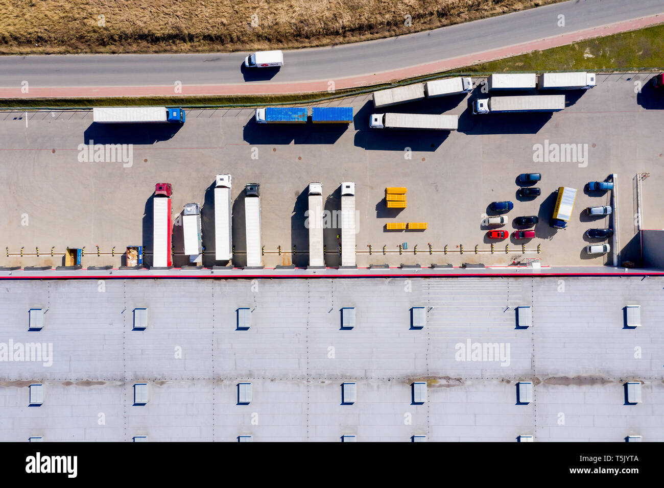 Aerial Shot of Truck with Attached Semi Trailer Leaving Industrial ...