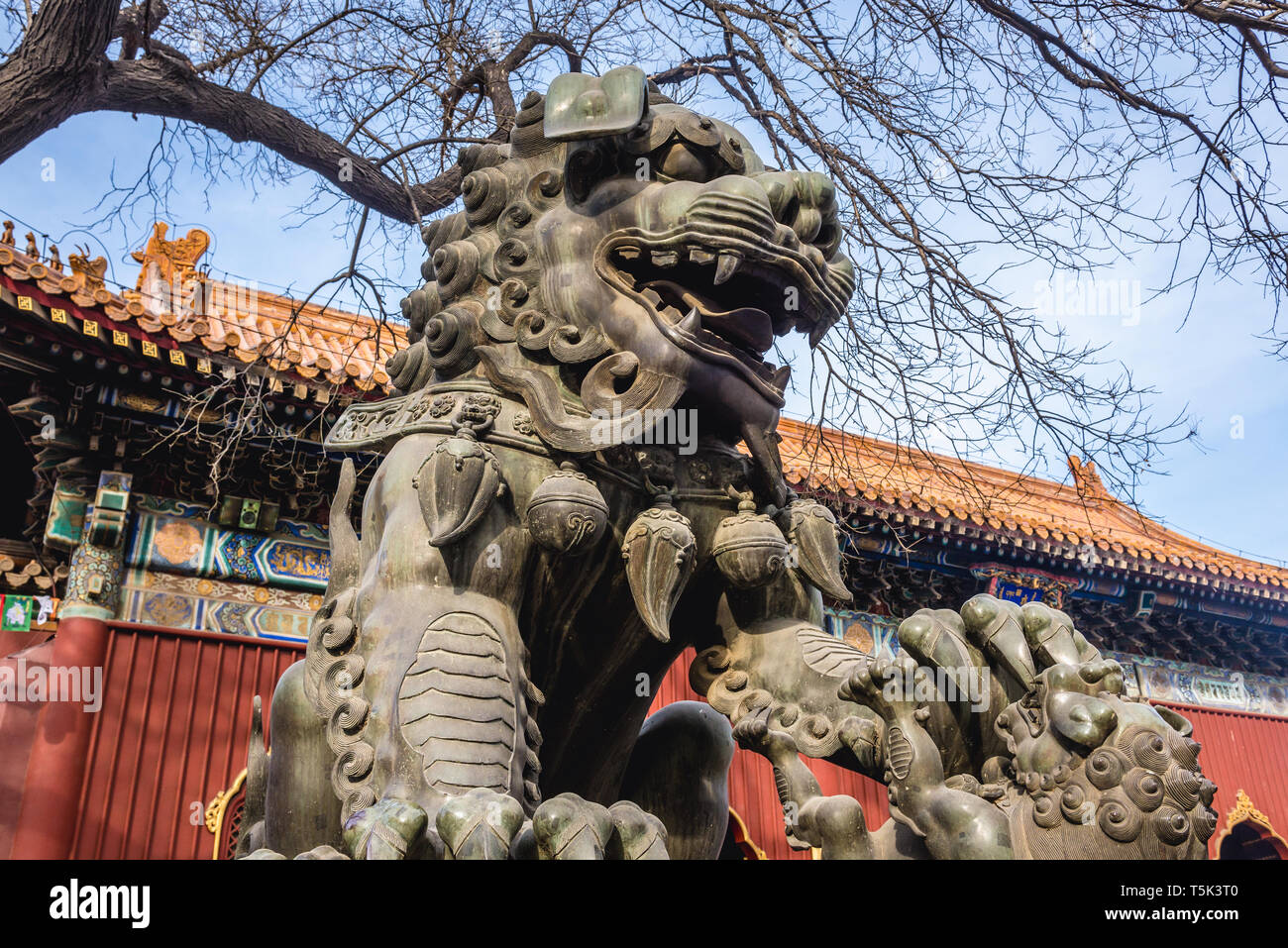 Female guardian lion with cub in Yonghe Temple also called Lama Temple ...
