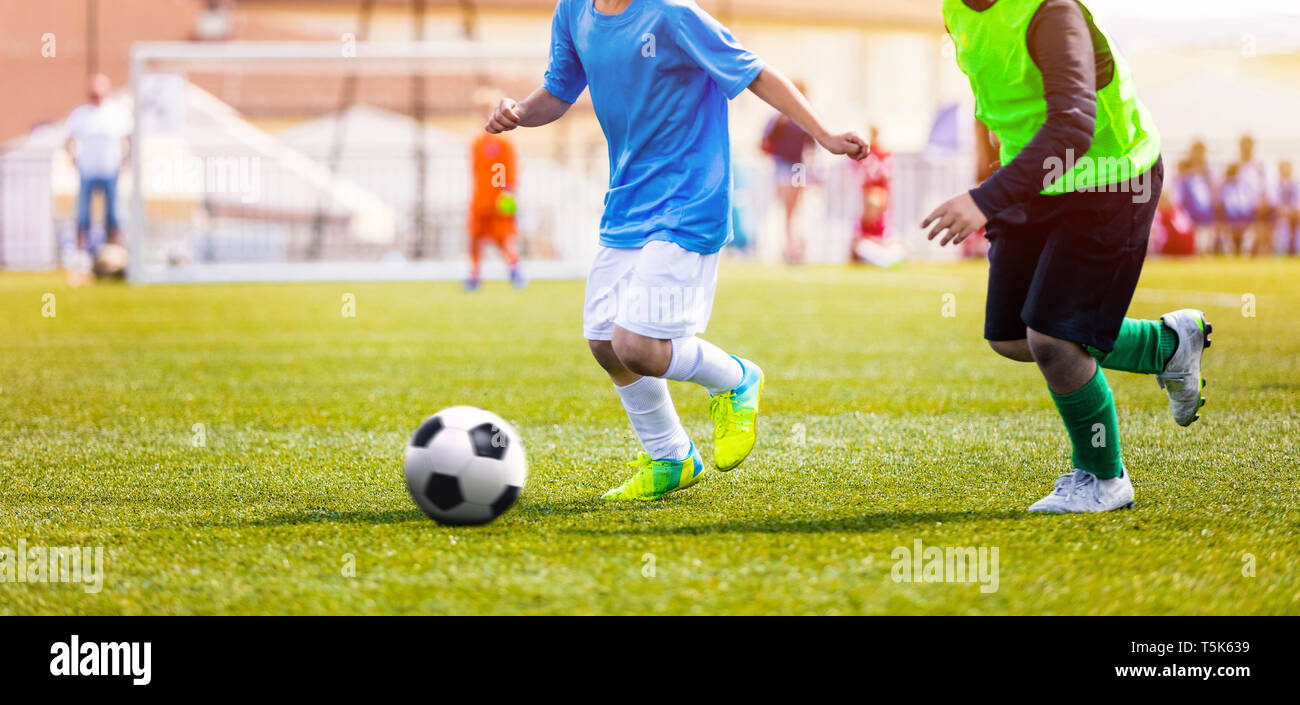 Football player yellow uniform running High Resolution Stock ...
