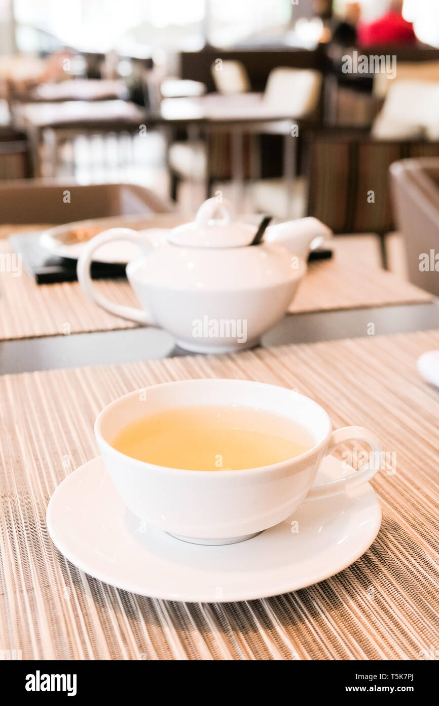 Healthy nutrition, relax and detox concept - Green herbal tea in a ...