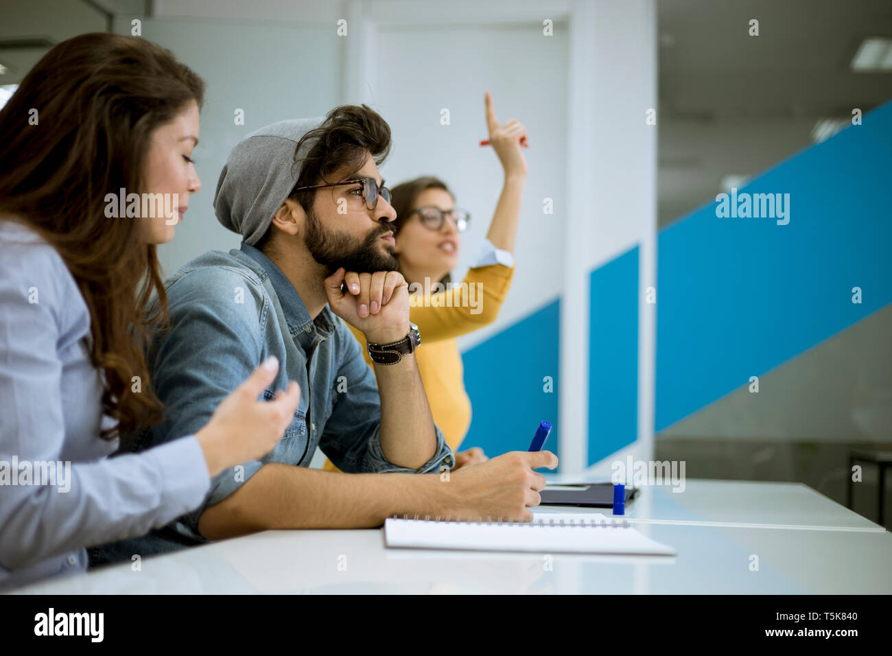 Hand rising women hi-res stock photography and images - Alamy