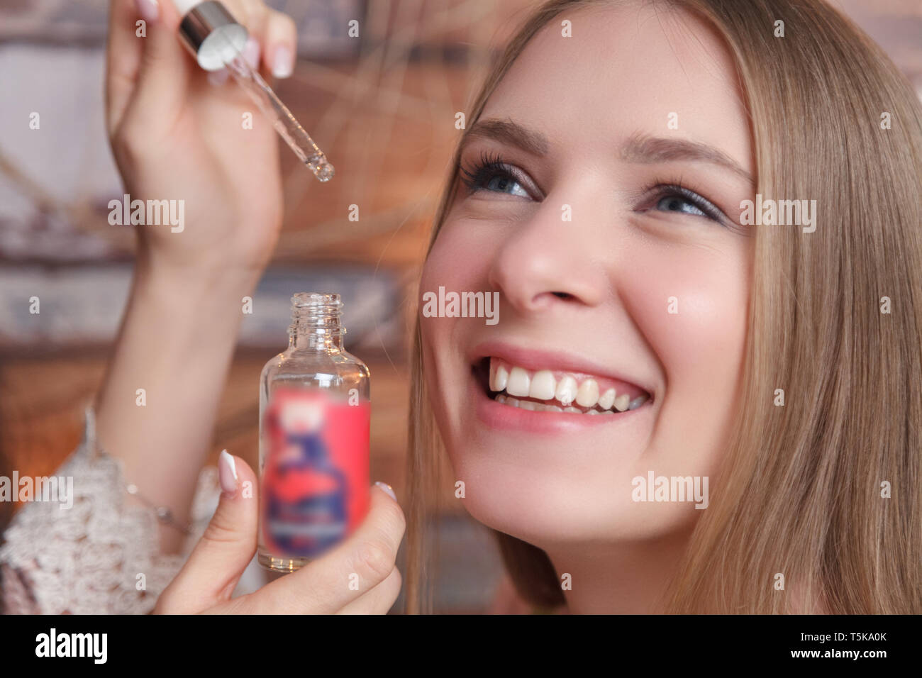 Beautiful cute smiling girls in pajamas advertise putting moisturizing ...