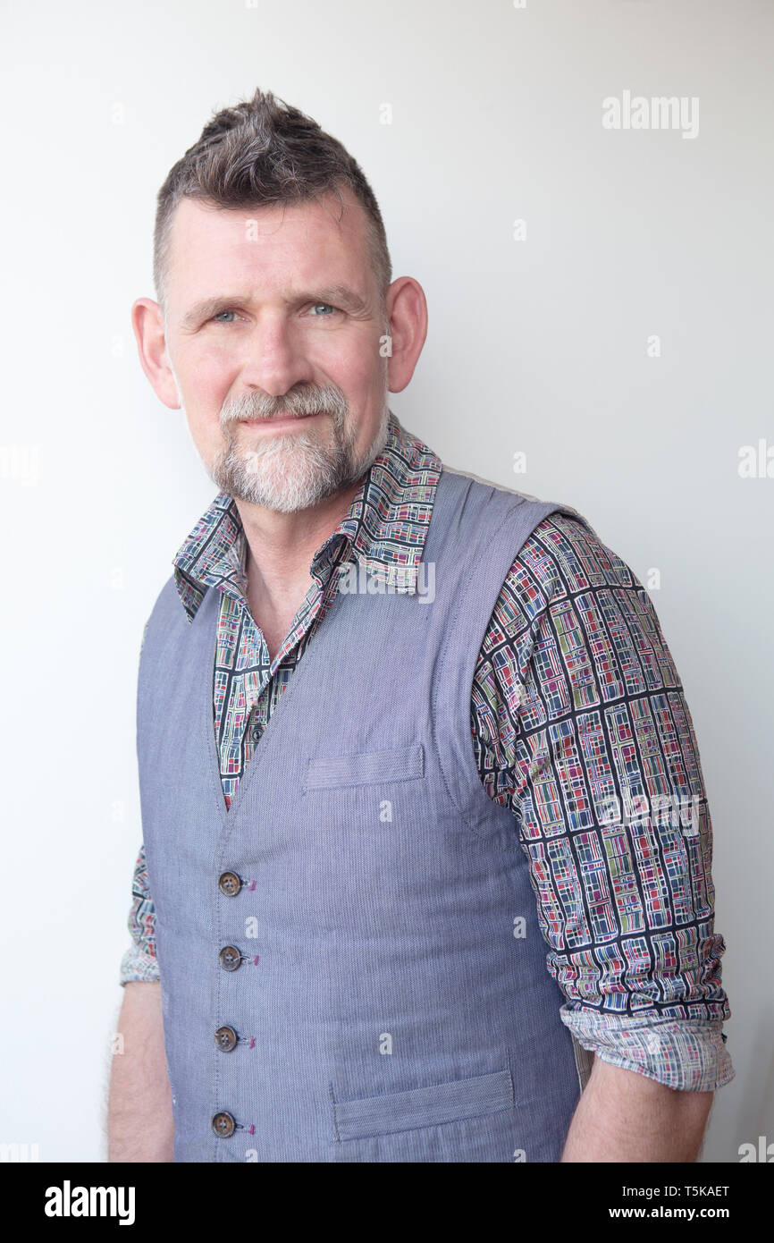 Handsome grey haired man hi-res stock photography and images - Alamy