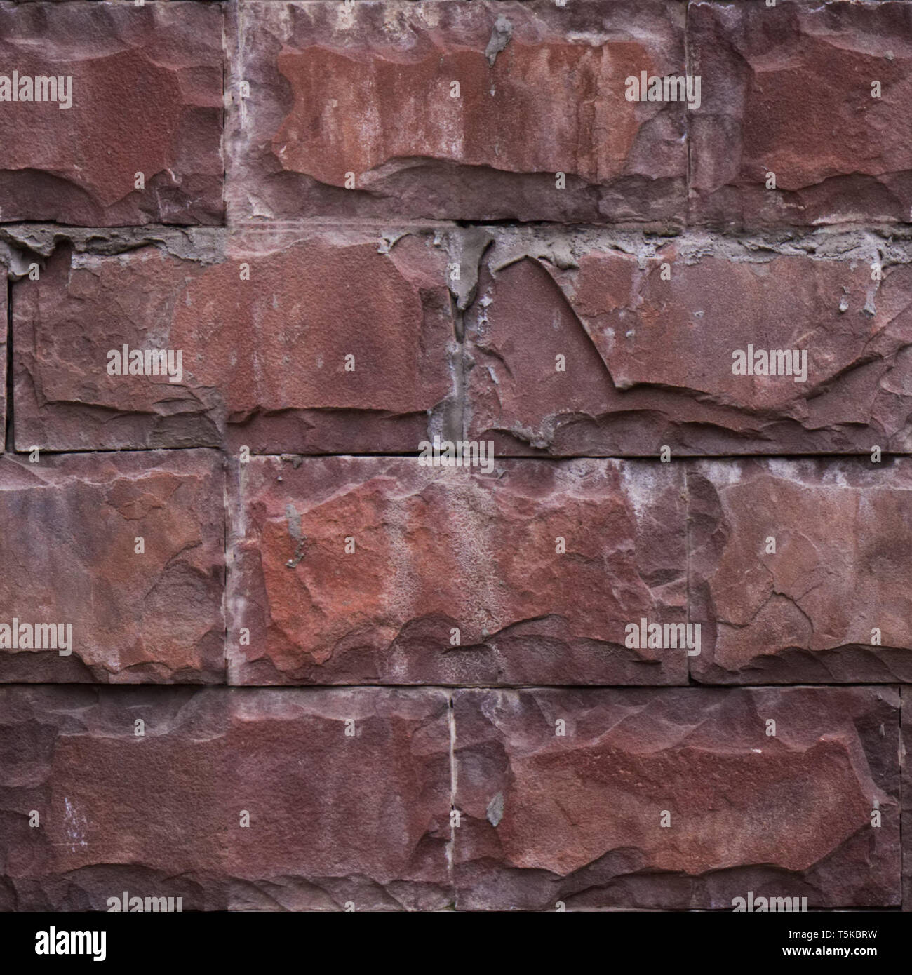 Red stone blocks hi-res stock photography and images - Alamy