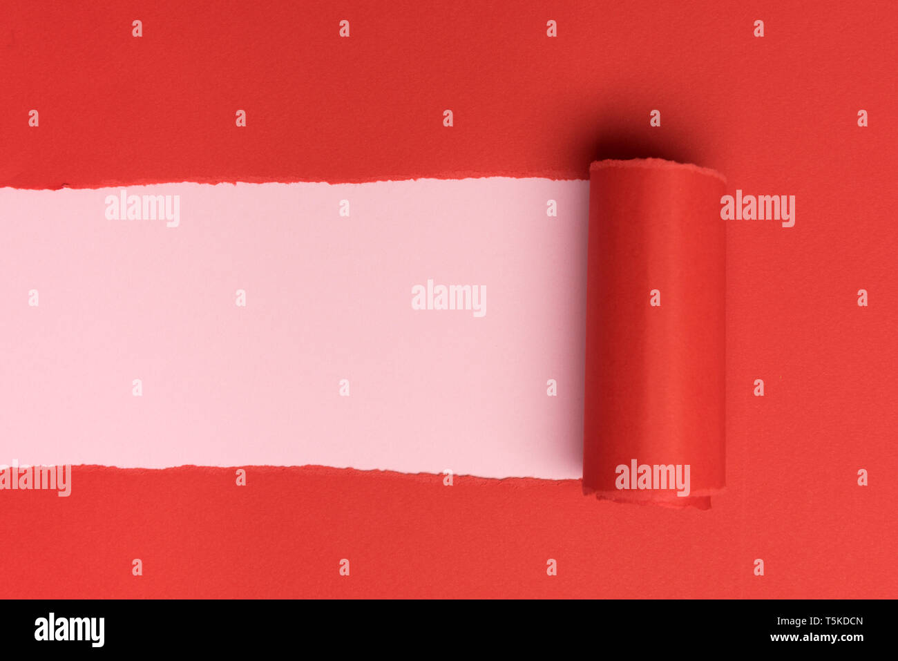 Red torned paper over pink background Stock Photo - Alamy
