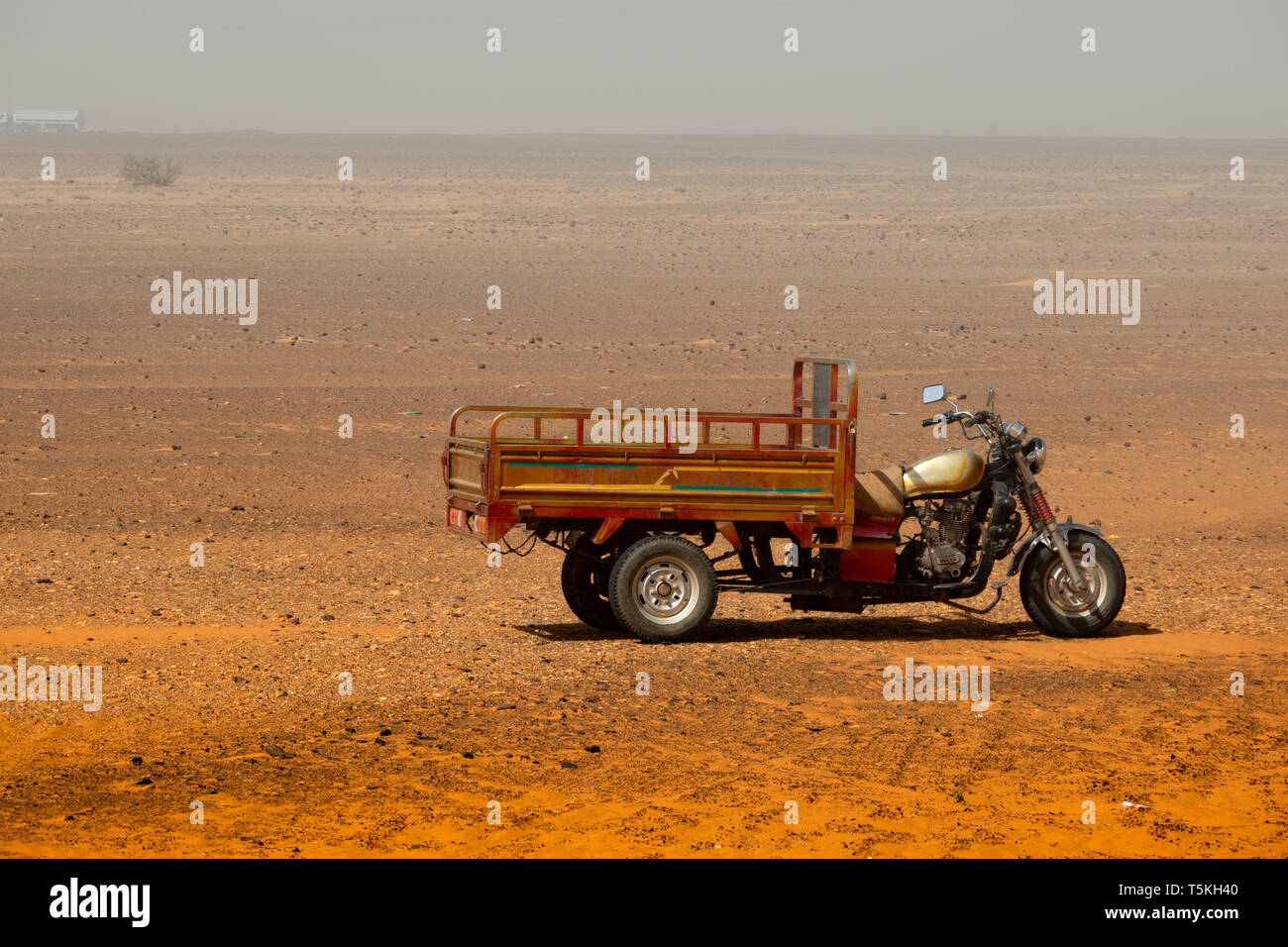 Meroe, Sudan, February 11., 2019: Motorcycle converted into a delivery ...