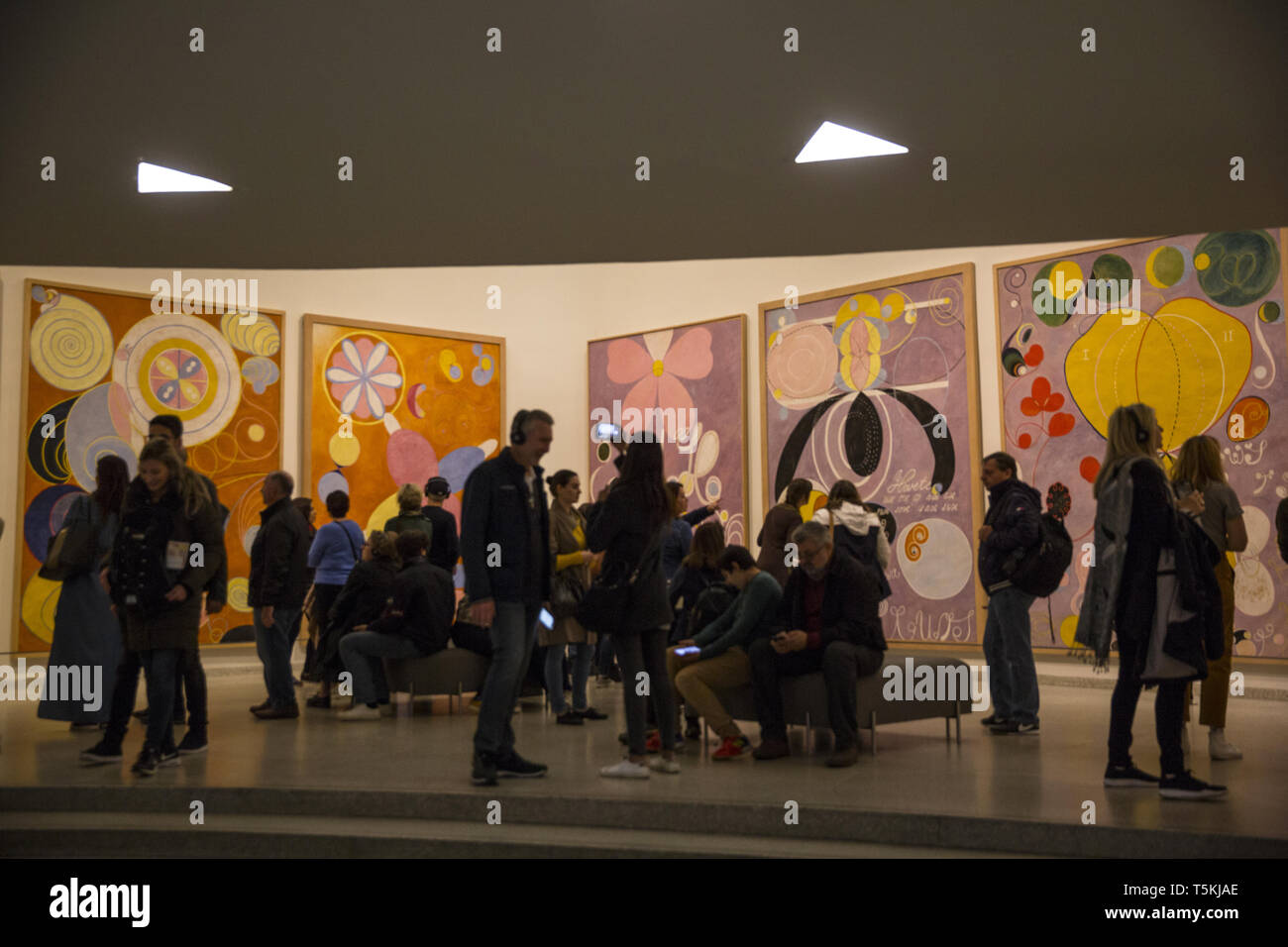 Museum goers at the Guggenheim Museum in New York City view the Hilma ...