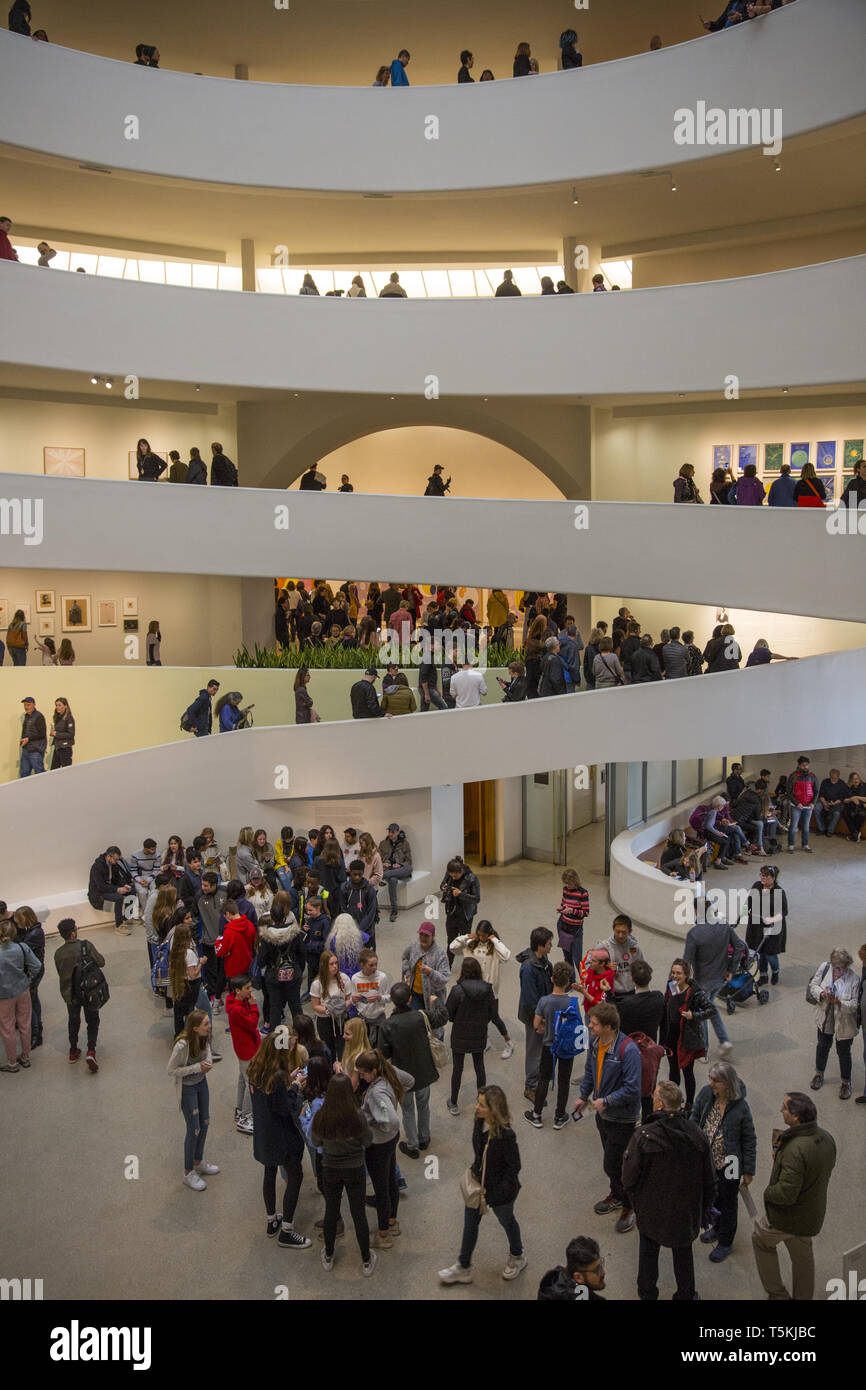 Museum goers at the Guggenheim Museum in New York City view the Hilma ...