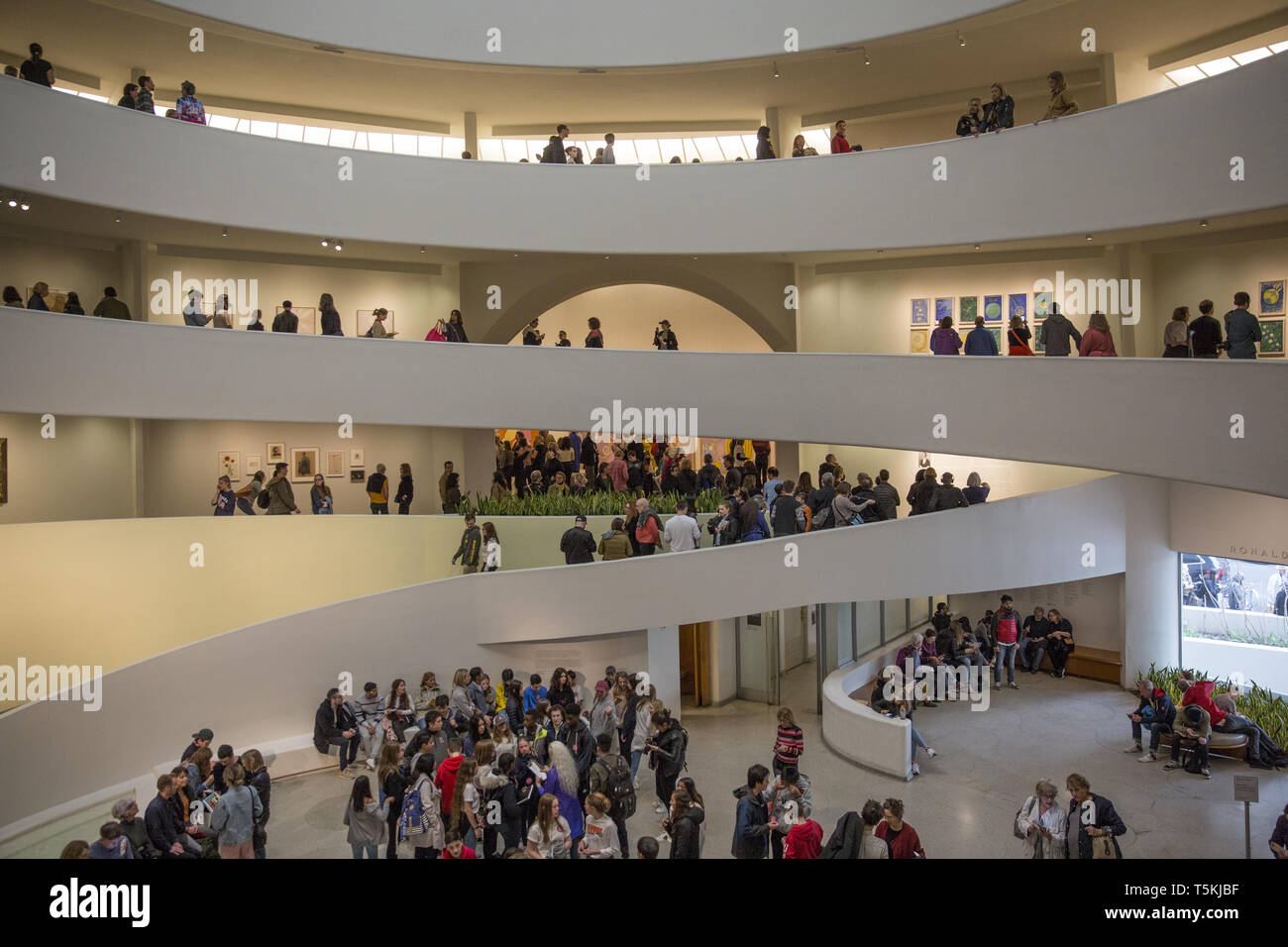 Museum goers at the Guggenheim Museum in New York City view the Hilma ...