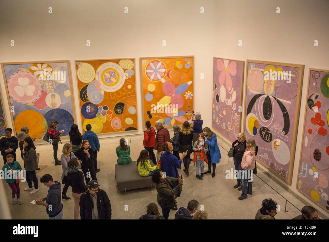 Museum goers at the Guggenheim Museum in New York City view the Hilma ...