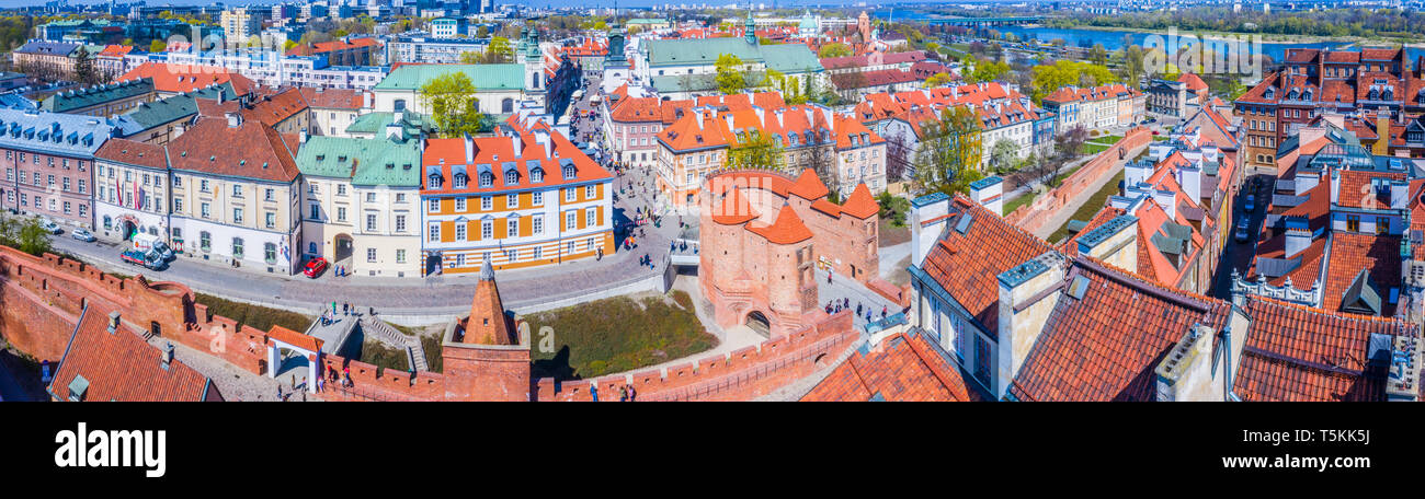 Warsaw, Poland red orange roof in old town market square with historic ...
