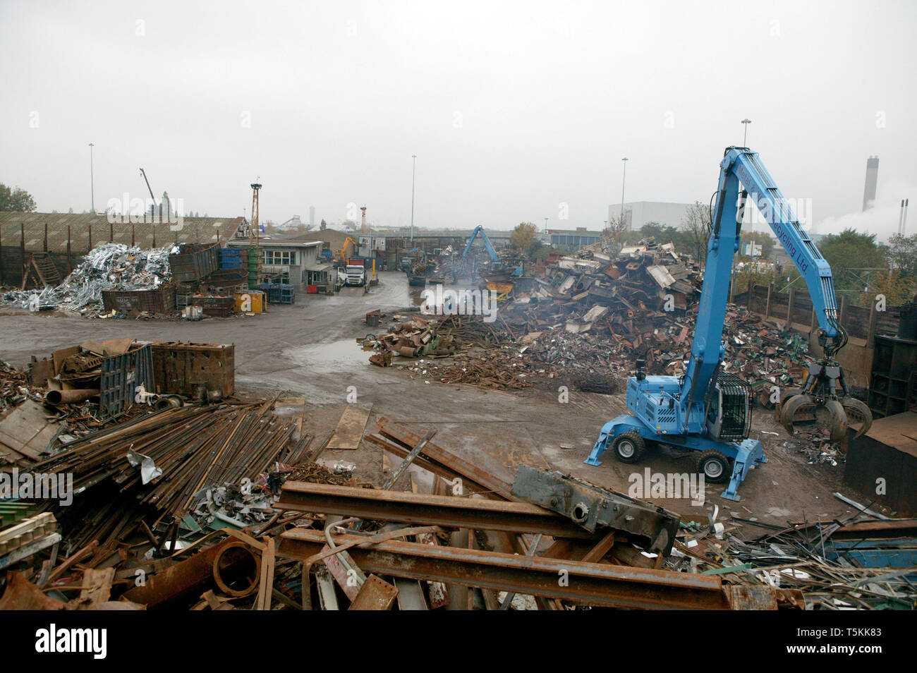 Recycling metal and waste materials at a scrap yard in North London. 3 ...
