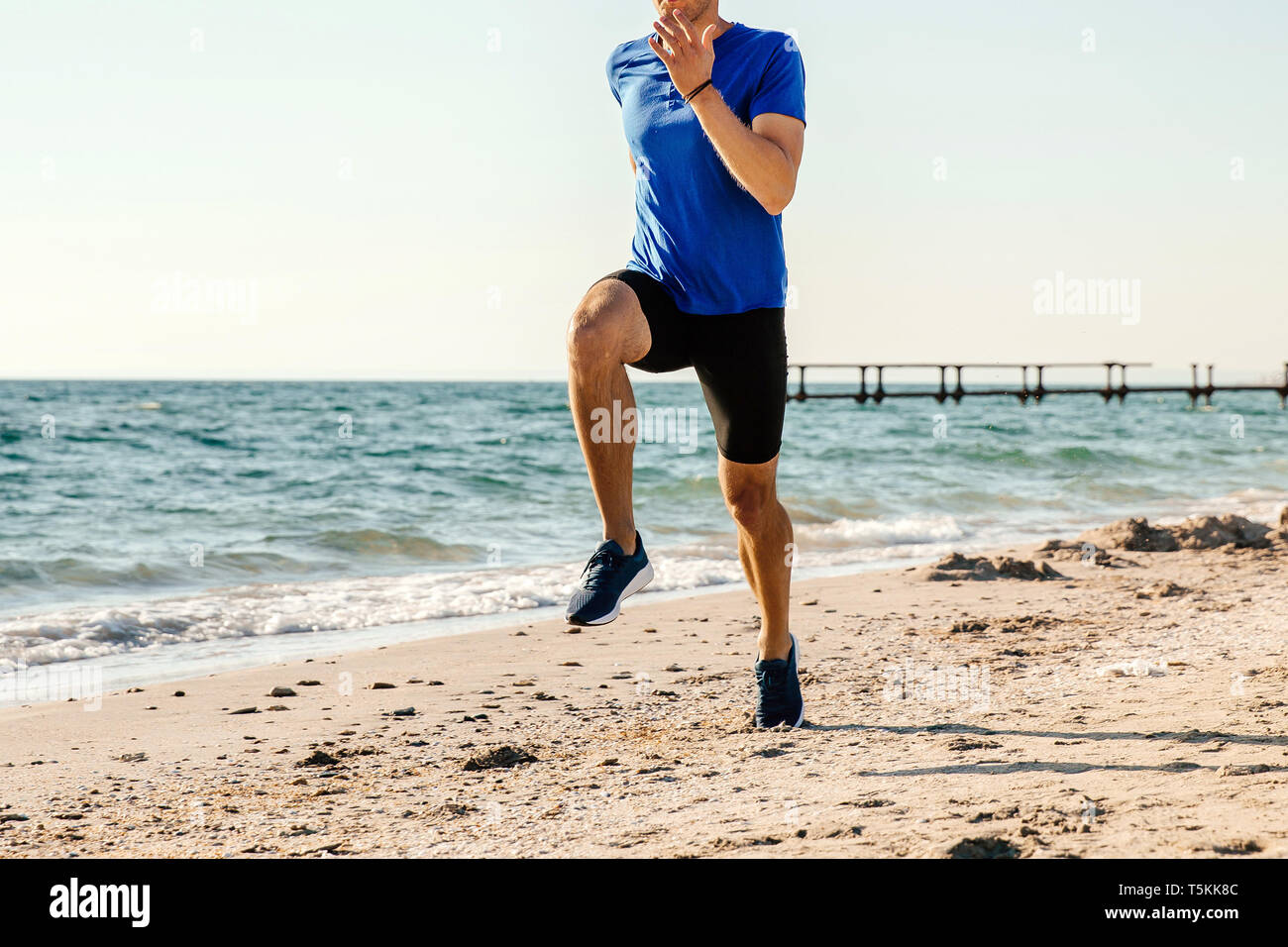 Black muscles on beach hi-res stock photography and images - Alamy