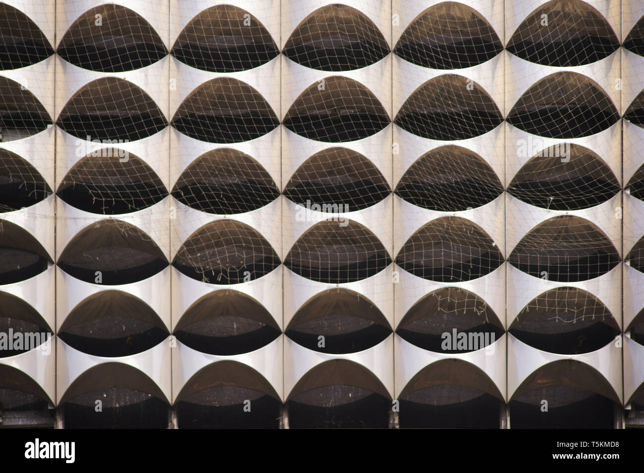 A modern and elegant facade cladding of a stainless steel business ...