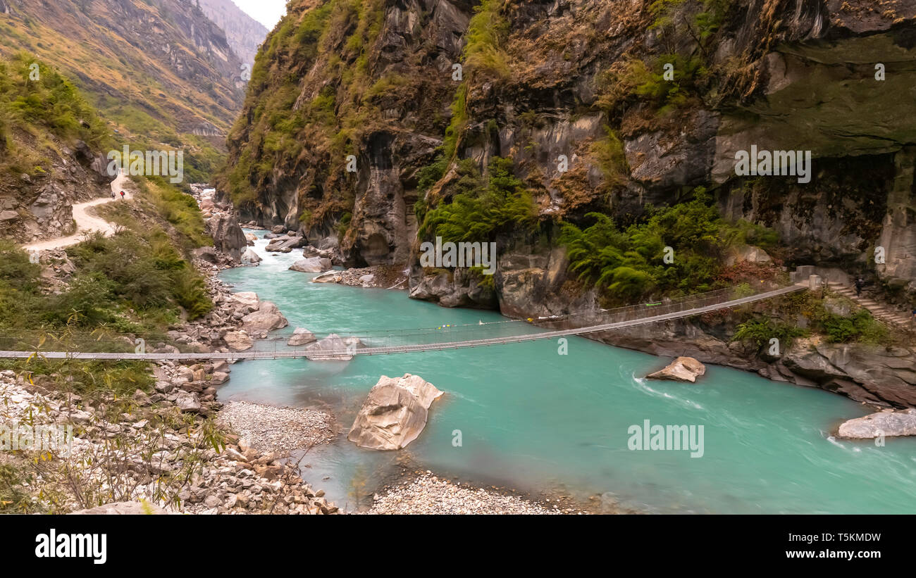 THE ROPE WAY CROSSING RIVER ON THE WAY ANNAPURNA CIRCUIT Stock Photo ...