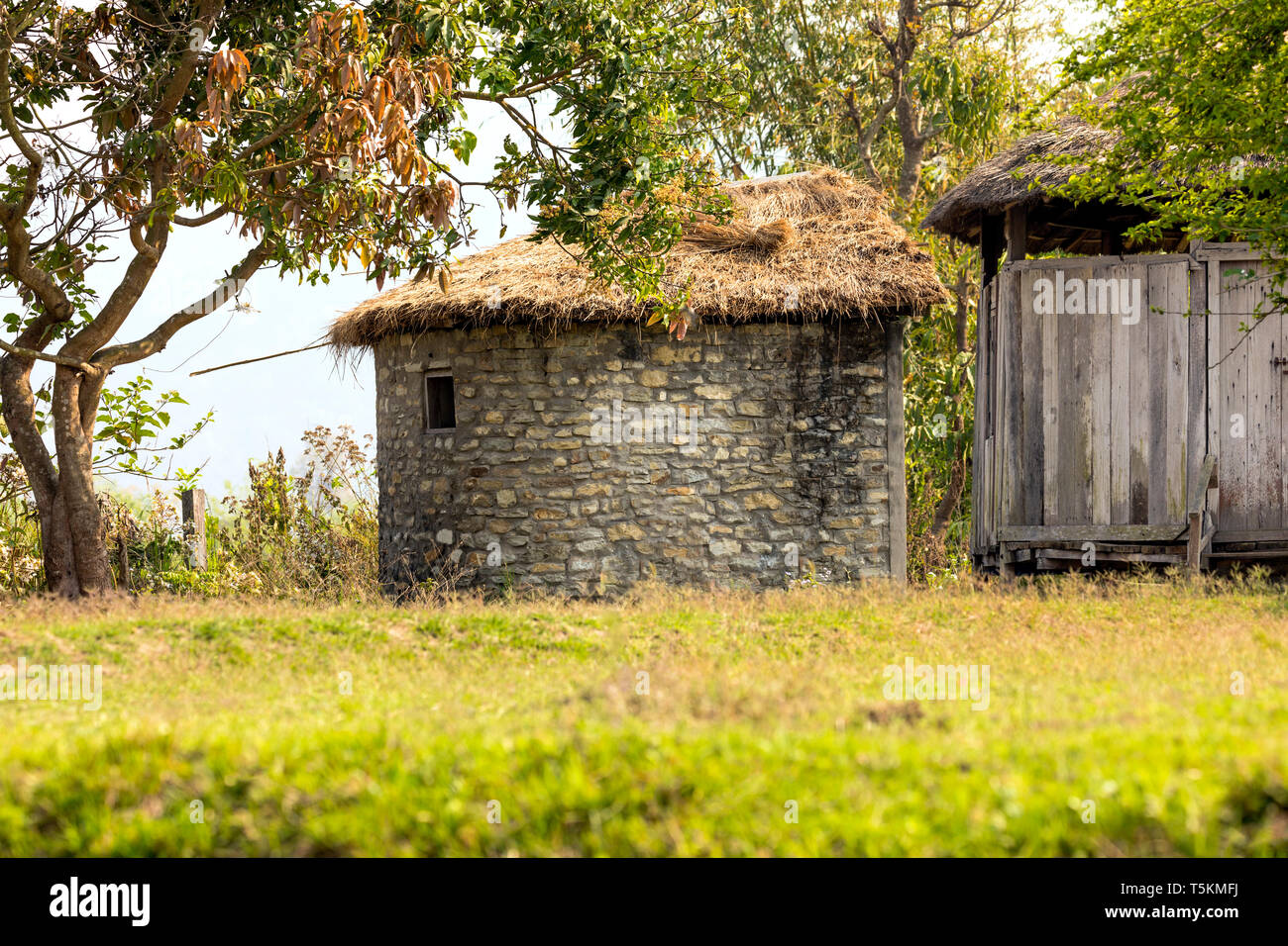 Stone wall house and wooden house with beautiful background,chiwan ...