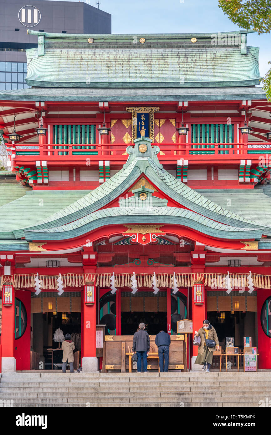 Tokyo, Japan - March 15, 2019 : Devoted people praying at Honden (Main ...
