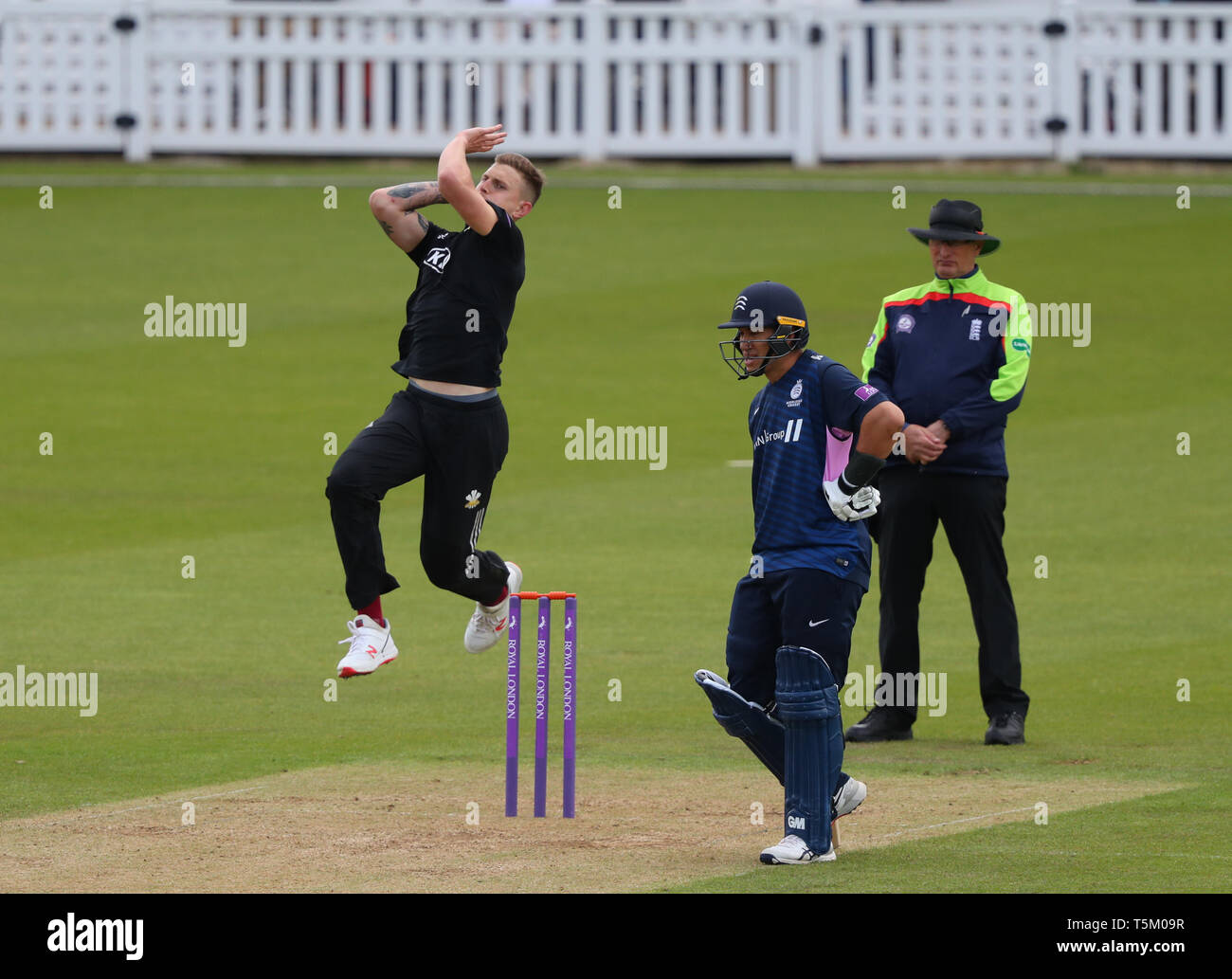 London, UK. 25th Apr 2019. Conor McKerr of Surrey bowling during the ...