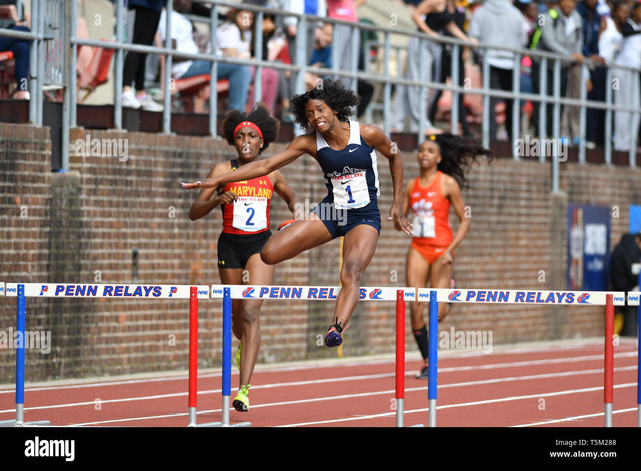 Winner of the 400m hurdles hi-res stock photography and images - Alamy