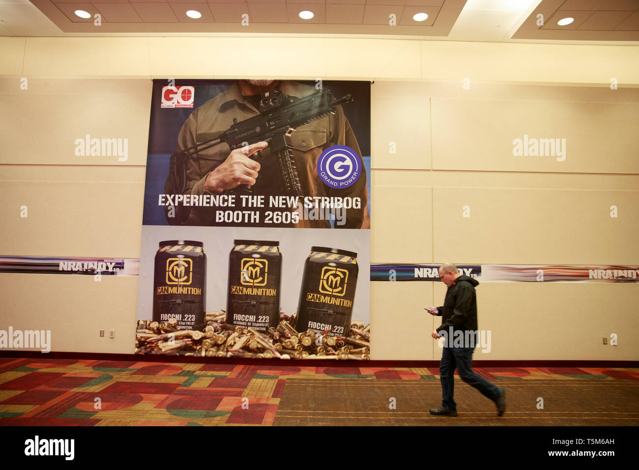 Advertisements and NRA banners cover the walls of the Indiana ...