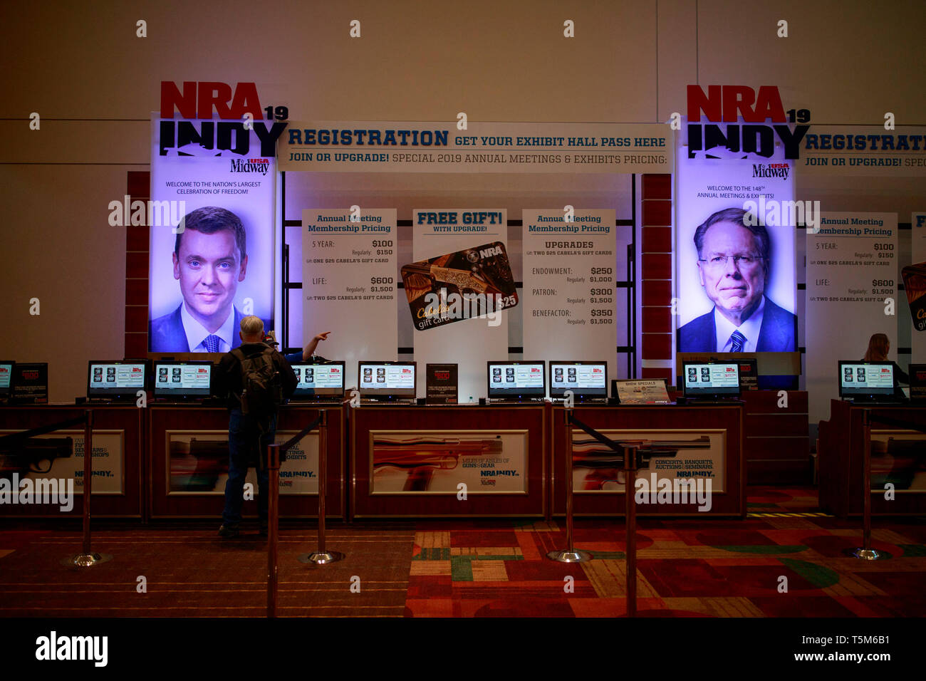Large photos of NRA-ILA Executive Director Chris W. Cox and CEO and ...