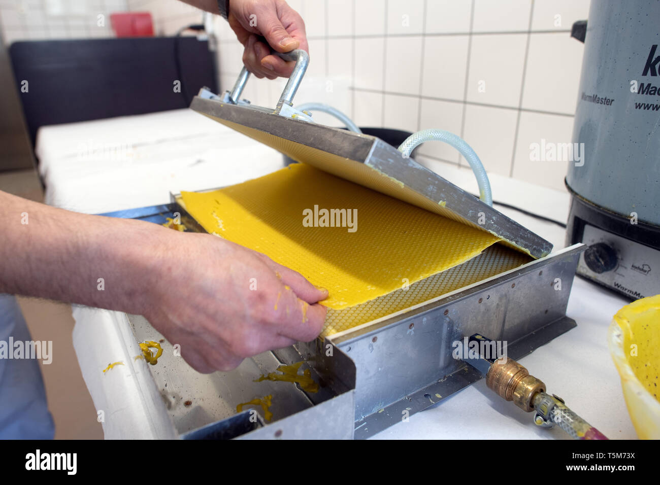 Remscheid, Germany. 10th Apr, 2019. A prisoner works on wax discs for ...