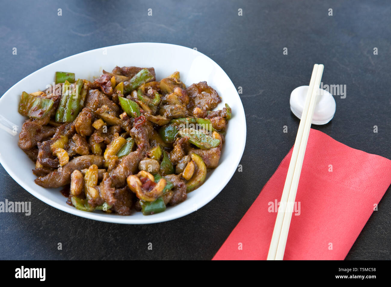 chinese beef meal setup at the restaurant Stock Photo - Alamy