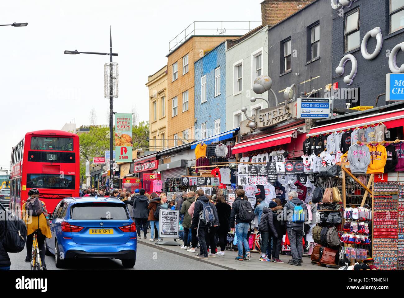 A crowded Camden Town high Street with tourists enjoying the colourful ...