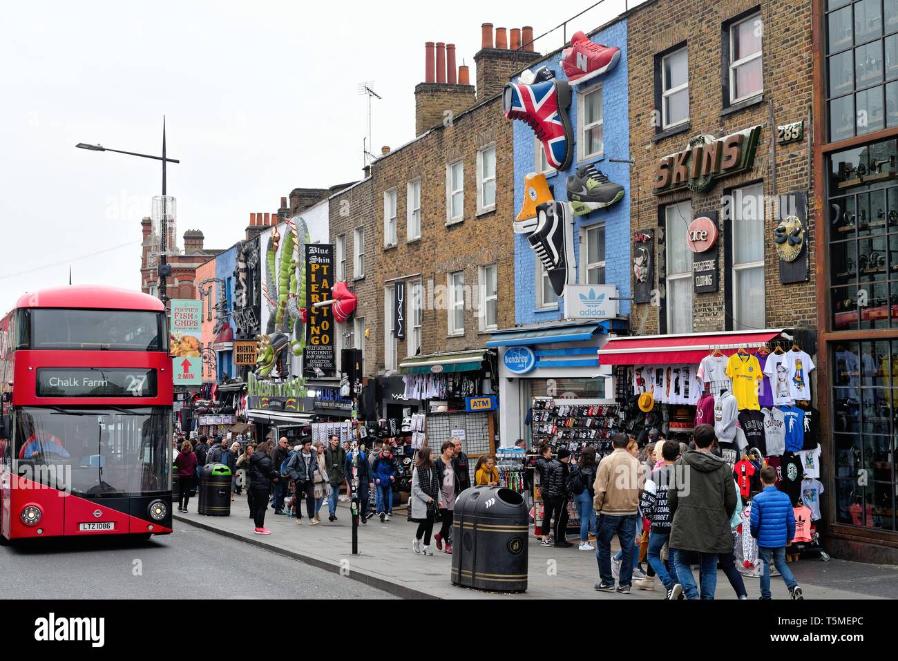 A crowded Camden Town high Street with tourists enjoying the colourful ...