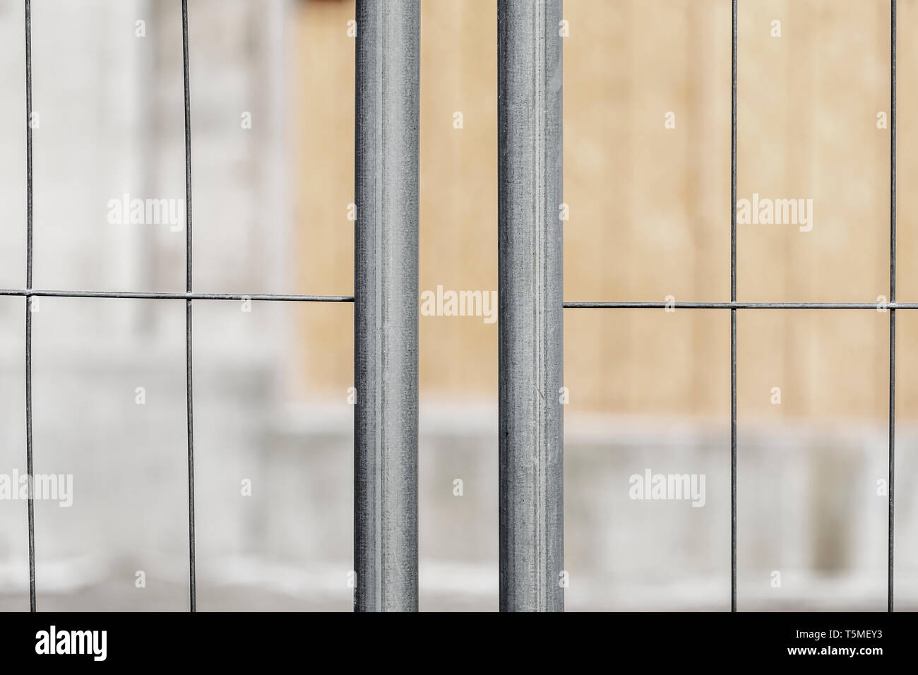 A steel fence for protection on the construction site Stock Photo - Alamy
